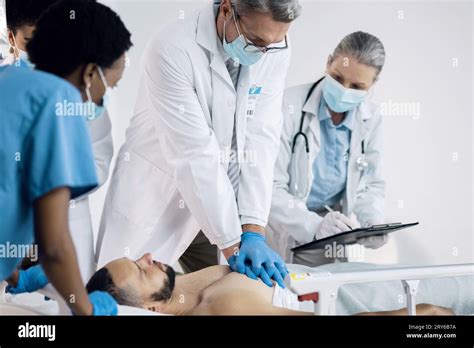 Cpr Emergency And Doctor With Patient In Hospital For Medical Service