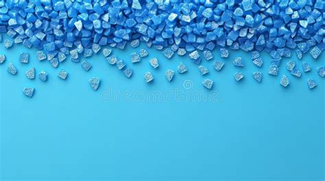 Top View Of Blue Plastic Polypropylene Granules Heap On Blue Backdrop