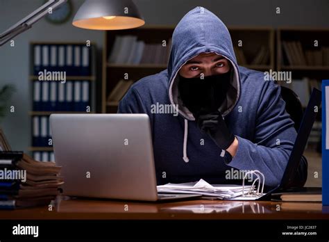 Hacker Stealing Personal Data From Home Computer Stock Photo Alamy