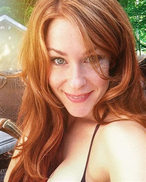 Playful And Coy Redhead Pic