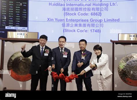 Zhang Yong Second Right Founder And Ceo Of Haidilao International Holding Ltd Poses During