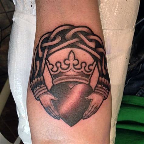 Claddagh Tattoos For Guys Symbolism Designs And Meaning