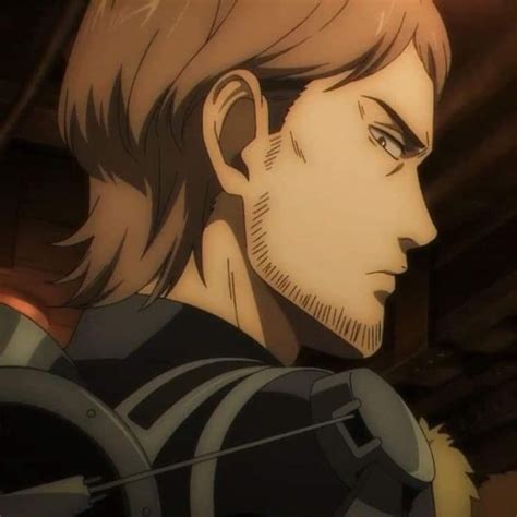 An Anime Character With Blonde Hair And Grey Eyes Stares At Something In The Distance Behind Him
