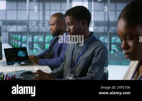 Team Of Engineers In Data Center Developing And Maintaining Disaster Recovery Plans Ensuring