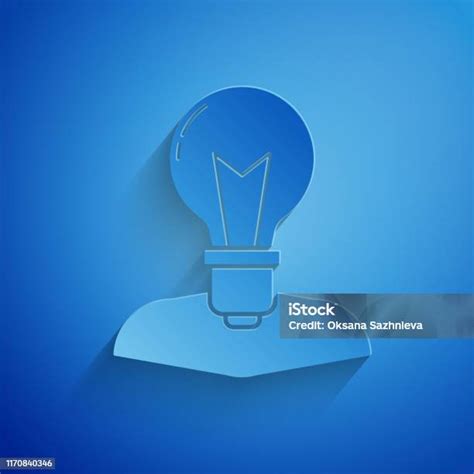 종이 는 파란색 배경에 격리 램프 전구 아이콘인간의 머리를 잘라 종이 아트 스타일입니다 벡터 일러스트레이션 개념에 대한 스톡