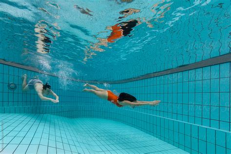 Ta Couple Friends Dive Underwater In A Residential Pool In Singapore