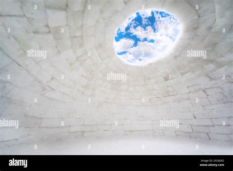Inside Empty House Of Ice Eskimo Igloo Blue Sky And Clouds Stock