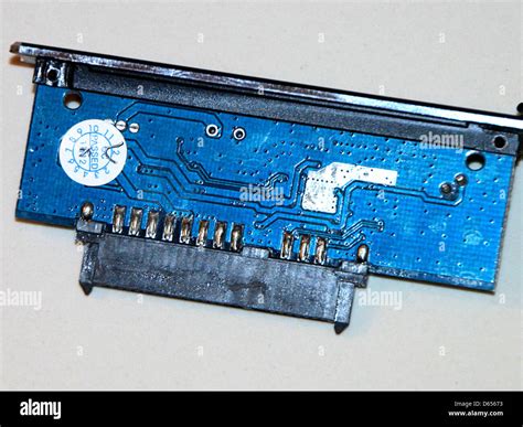 This Image Shows A SATA To USB Hardware Interface Used For Connecting Hard Drives To
