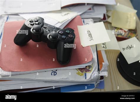 Sony Playstation 2 PS2 Game Controller Placed On Stack Of Homework Stock Photo Alamy