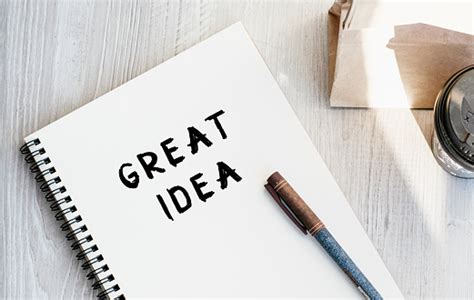 비문 좋은 아이디어와 메모장 테이블에 아침 식사와 커피와 종이 가방 종이 컵 위에서 볼 수 있습니다 마케팅 컨셉 0명에 대한 스톡 사진 및 기타 이미지 Istock