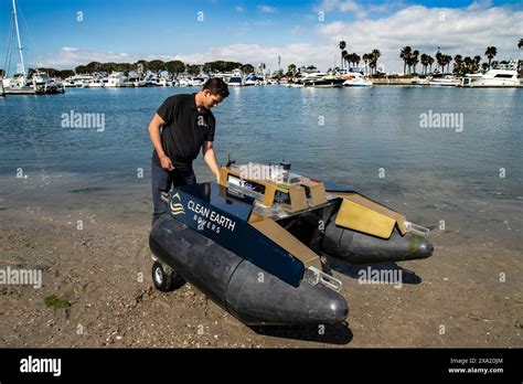 A Robot Floating Trash Collector Is Readied For Launching In Huntington