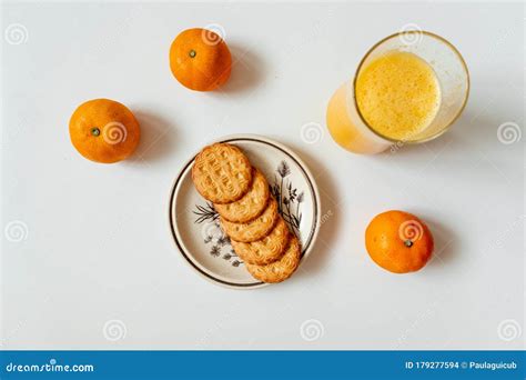 Flat Lay Mediterranean Breakfast Orange Juice Biscuits And Tangerines