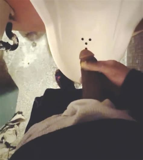 Cocky Bull Pisses All Over Urinal