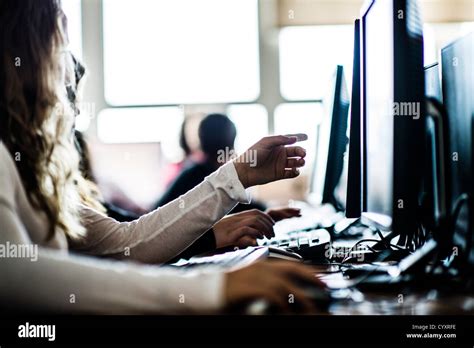 Pupils Girls Using Information Technology Computers Computing At A