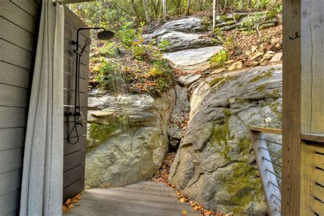 River Rock Treehouse With Open Loft Has Wrap Around Deck