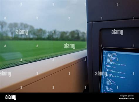 Selective Focus Open Laptop Or Notebook Working As Programmer And Do Some Coding On The Train