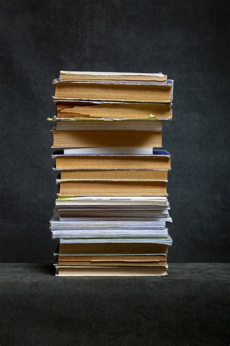 A Stack Of Old Books And Notebooks On The Table Stock Image Image Of Composition Dark
