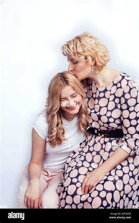 Mother With Teen Daughter Together Posing Happy Smiling Isolated On