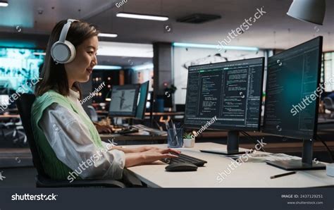 Female Asian Game Programmer Coding On Stock Photo 2437129251 Shutterstock