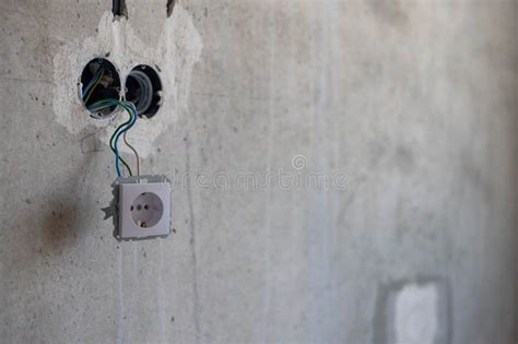 Close Up Of A Power Plug Connected To An Electrical Socket During Renovation Stock Image Image