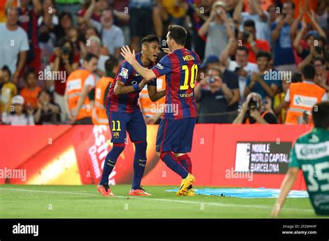 Neymar Jr Celebrates With Lionel Messi During The 2014 Joan Gamper