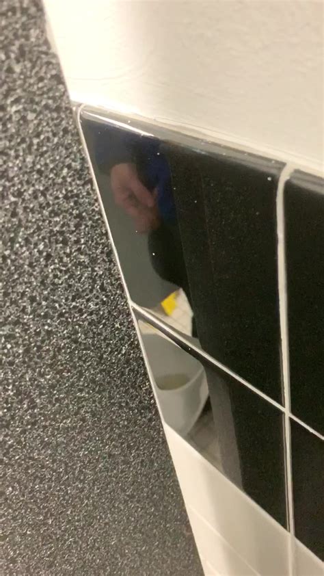 Black Reflective Tile Shows A Huge Cock