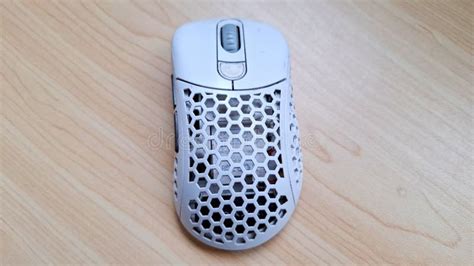 White Gaming Mouse With Honeycomb Patternthis Mouse Has An Ergonomic