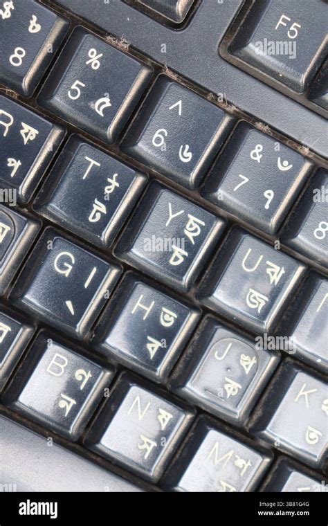 Detailed Close Up Unveils The Dirty Black Keyboard With Bengali