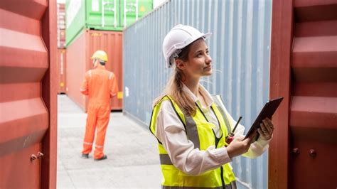 Premium Photo Woman Manager Using Tablet For Checking Code Of Cargo Container Before Import