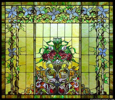 A Stained Glass Window With Flowers On It