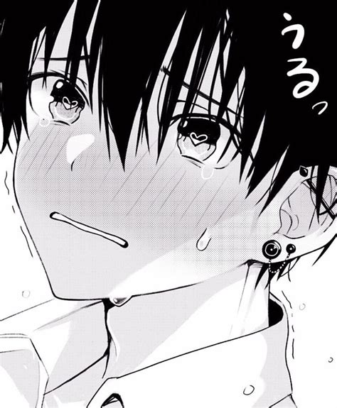 An Anime Character With Black Hair And Piercings On His Ears Staring