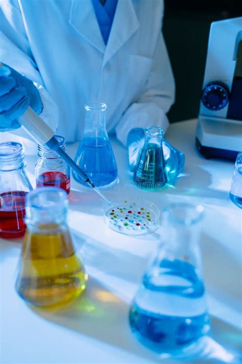 Female Biotechnologist Testing New Chemical Substances In A Laboratory