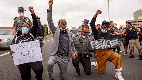 George Floyd Protesters Embrace Taking A Knee For Race Awareness
