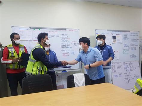 Receiving The Certificate Of Promotion From Honorable Project Manager