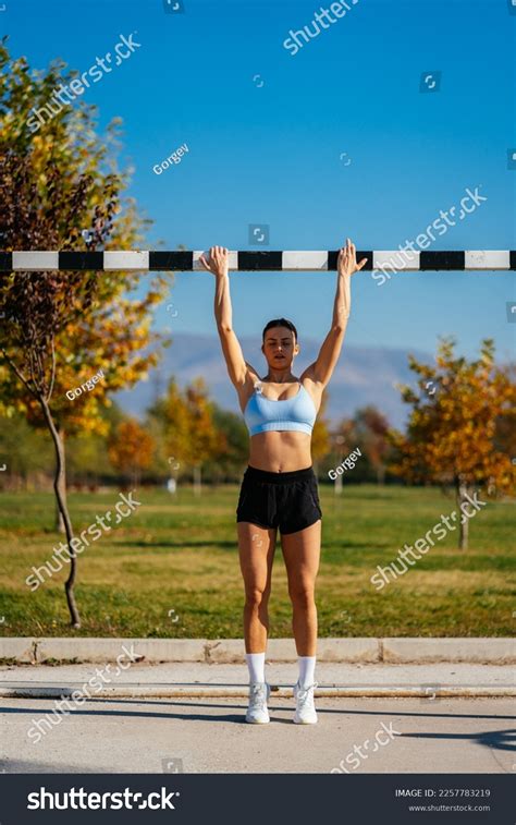 Sexy Girl Doing Pull Ups Holding Stock Photo 2257783219 Shutterstock