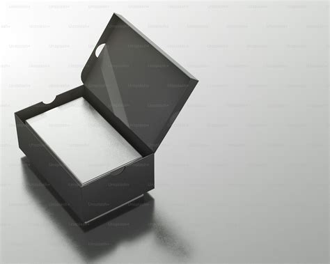 흰색 뚜껑이 있는 개방형 검은색 상자 사진 Unsplash의 3d 이미지