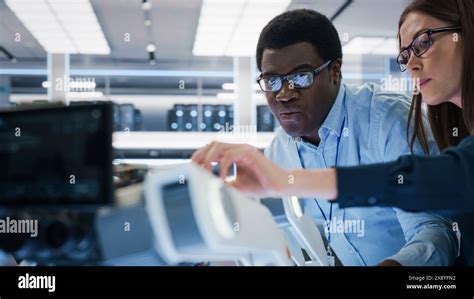 Close Up Portrait Of A Young Black Multiethnic Engineer And Female
