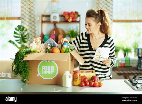 Food Delivery Happy Modern Middle Aged Housewife With Food Box And