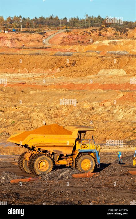 Open Mining Pit With Heavy Machinery Stock Photo Alamy