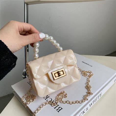 กระเป๋าสะพายไหล่ เนื้อเจลลี่ ขนาดเล็ก แบบพกพา ระดับไฮเอนด์ สไตล์ตะวันตก แฟชั่นสําหรับสตรี 2021