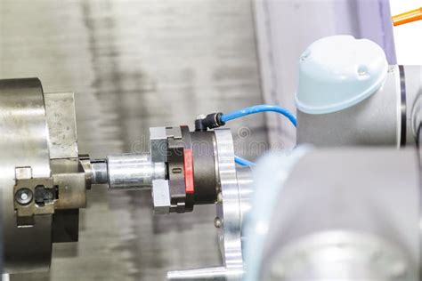 Robot Arm Auto Load And Unload Cnc Turning Part Stock Image Image Of