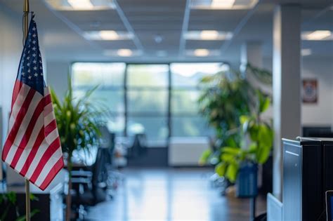 Premium Photo Us Flag Hangs From A Flagpole In A Large Empty Office Room Generative Ai