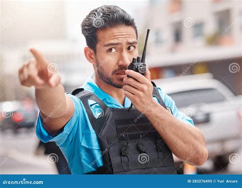 Man Police And Pointing With Walkie Talkie In City For Emergency Dispatch Arrest Or Calling