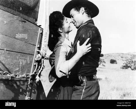 THE COMMAND Joan Weldon Guy Madison 1954 Stock Photo Alamy