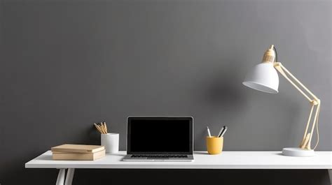 Premium AI Image A Desk With A Lamp And A Laptop On It
