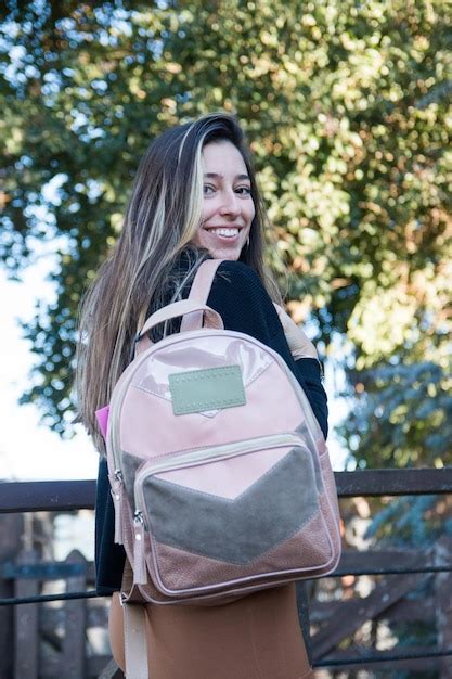 Premium Photo Sensual Blond Woman Wearing Backpack