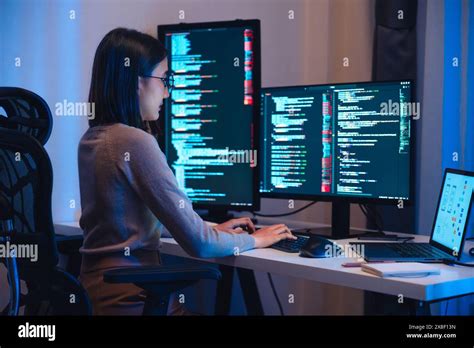 Asian Woman Software Development Working On Coding Computer Screen And