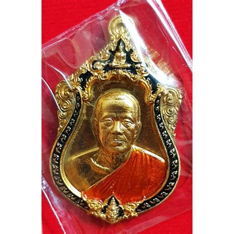 เหรียญเจ้าสัวพันล้าน หลวงพ่อทอง จัดสร้างโดย คุณ บอยท่าพระจันทร์ เนื้อสัมฤทธิ์ลงยา จีวร ขอบดำ ขอบ