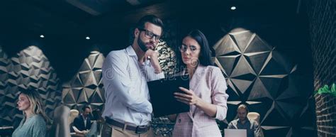 Portrait Of Nice Attractive Qualified Expert Analyzing Paper Document