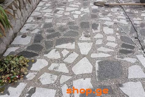 ქვის დაგება ეზოს მოპირკეთება